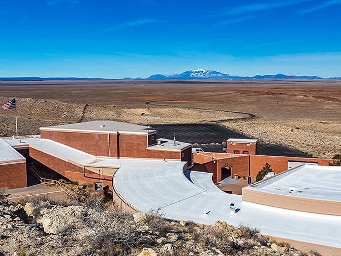 A bird's-eye view that's out of this world! The crater and its surroundings paint a picture of Arizona's rugged beauty that even Bob Ross would envy.