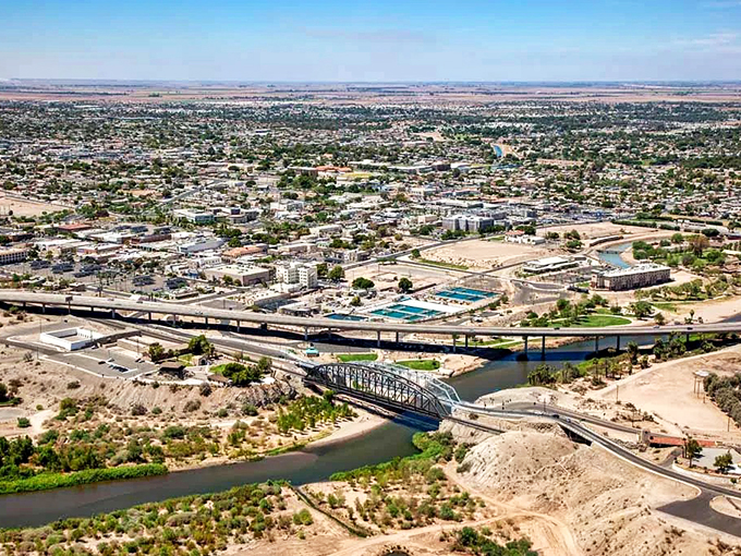 Yuma from above: A patchwork quilt of desert, city, and river. It's like someone spilled Legos across the landscape &ndash; in the best way possible.