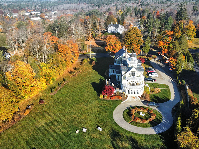 Bird's eye bliss! From up here, it looks like Mother Nature decided to frame the inn with her finest fall foliage.