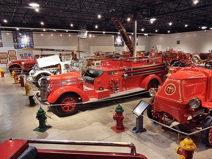 Red alert! Vintage fire engines stand at attention, ready to roll into your heart and ignite your imagination.