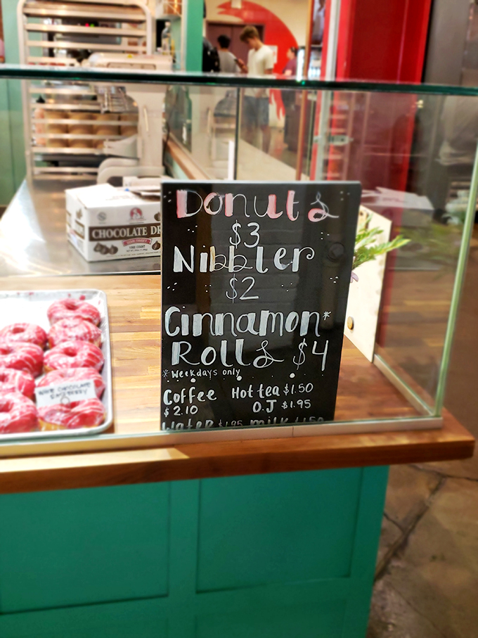 Decisions, decisions! This chalkboard menu is a sweet siren song, tempting you with nibbles, full-sized indulgences, and the promise of cinnamon-y bliss.