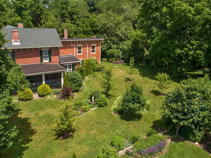 Who needs a white picket fence when you've got a lush green paradise? This garden oasis is where relaxation goes to relax.
