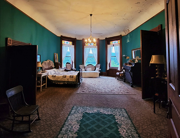 Fifty shades of green? This bedroom's bold hue choice would make even the Emerald City jealous. Talk about sleeping in style!