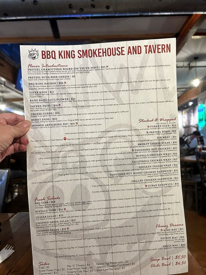 Behold, the sacred text of BBQ! This menu is a roadmap to flavor town, with detours through mac and cheese heaven.