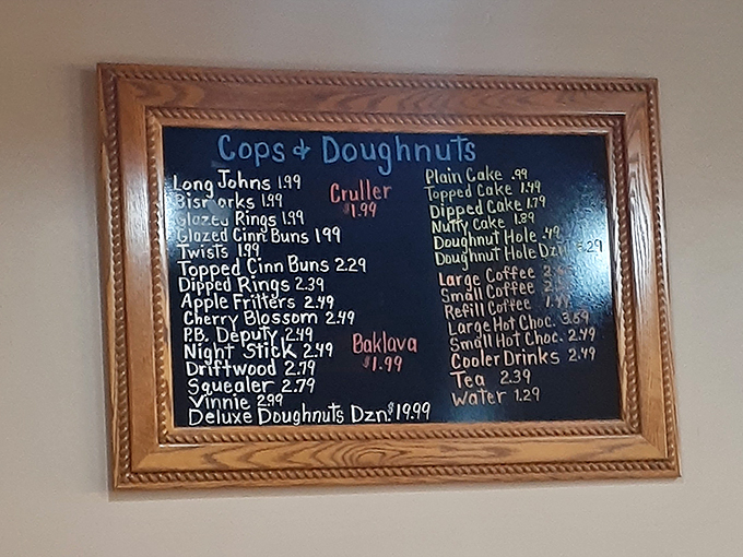 Behold, the menu of dreams! From "Glazed Guns" to "Nightsticks," this chalkboard reads like a delicious police blotter. Resist arrest? Not a chance!
