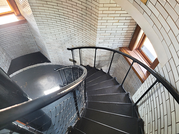 Spiral staircase secrets: Each step in this lighthouse tower whispers tales of keepers past. Watch your head, but don't miss the view!