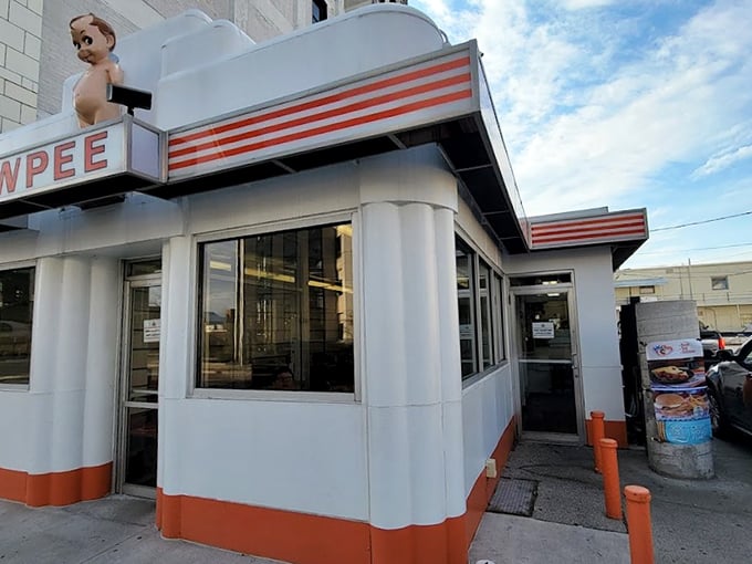 Pit stop perfection: Kewpee's gleaming exterior promises relief for weary travelers and hungry locals alike.