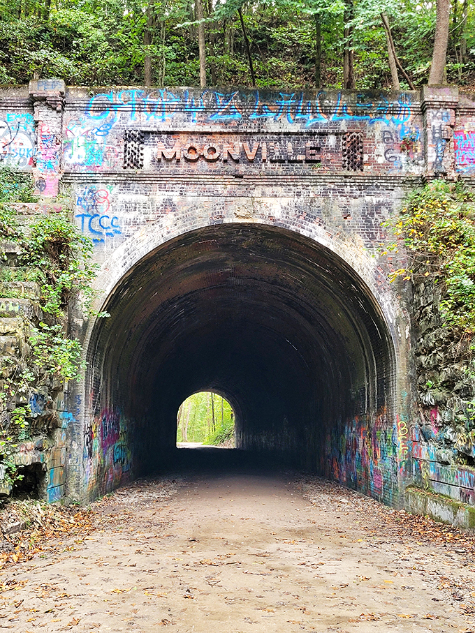 Where ghostly whispers meet graffiti art. This tunnel is like a time capsule with a dash of modern rebellion &ndash; history's canvas gets a colorful update.