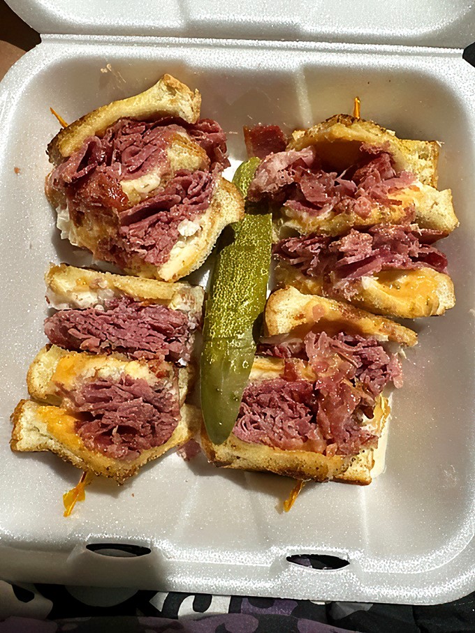 Behold, the sandwich of champions! This corned beef behemoth is ready to wrestle your hunger into submission.