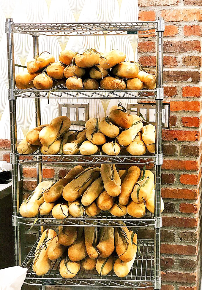 Behold, the bread whisperer's masterpiece! These loaves, adorned with palm fronds, are like edible works of art. Da Vinci had his Mona Lisa; La Segunda has its Cuban bread.