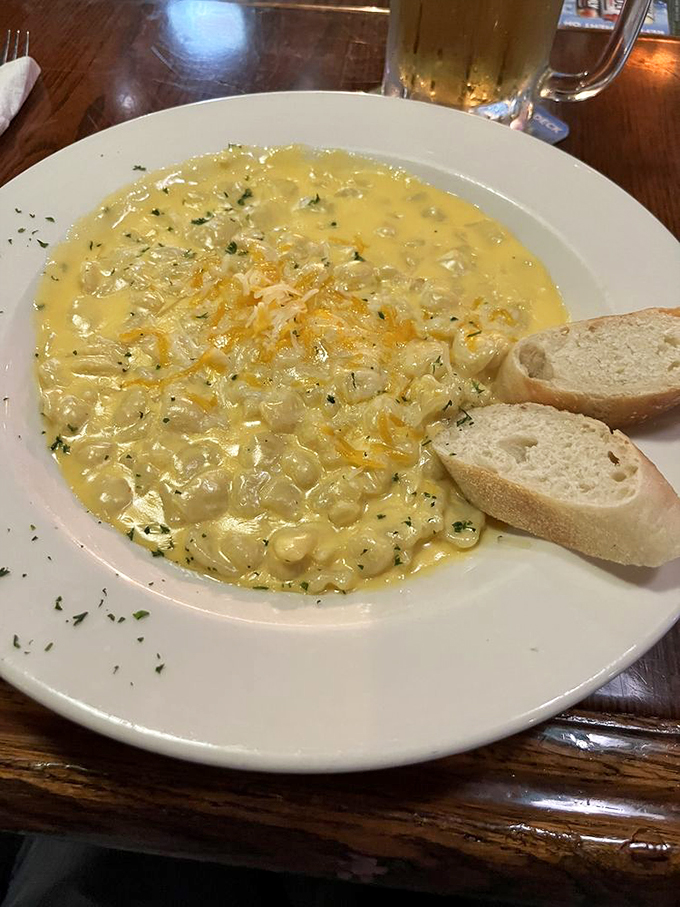 Behold, the mac and cheese that launched a thousand food comas! This creamy concoction is comfort food's answer to a warm hug.