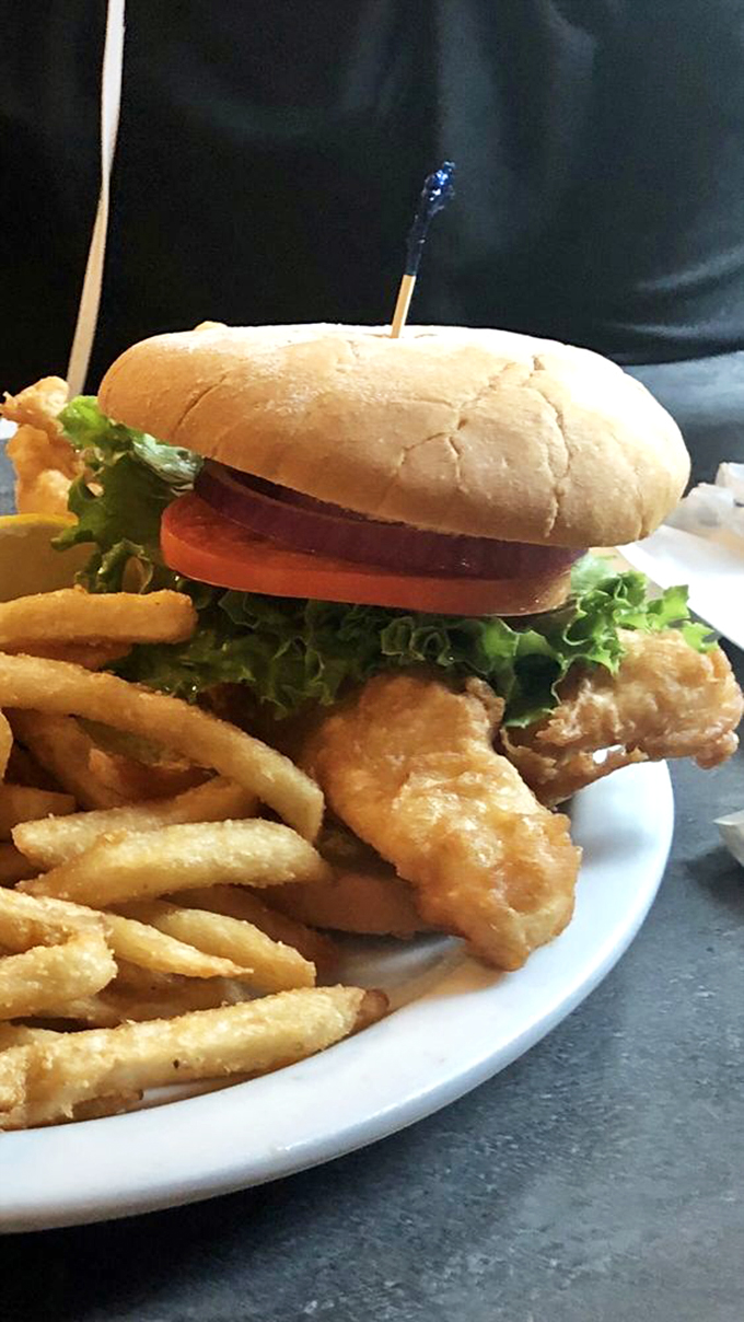 Behold, the sandwich that launched a thousand food comas. This haddock masterpiece is so good, it might just convince you to move to Florida permanently.