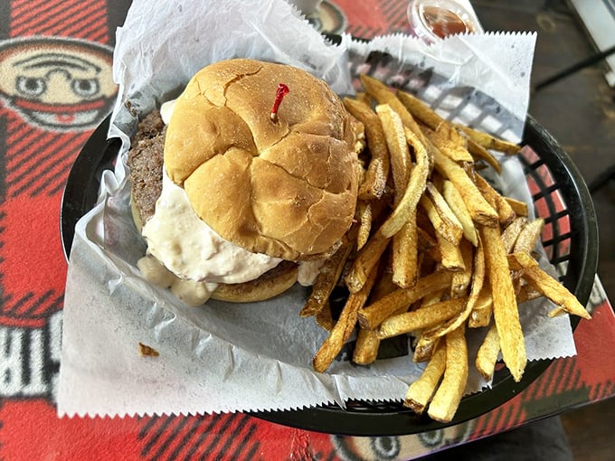 Holy cow! This burger's so juicy, you might need a bib. It's not just a meal, it's a delicious balancing act.