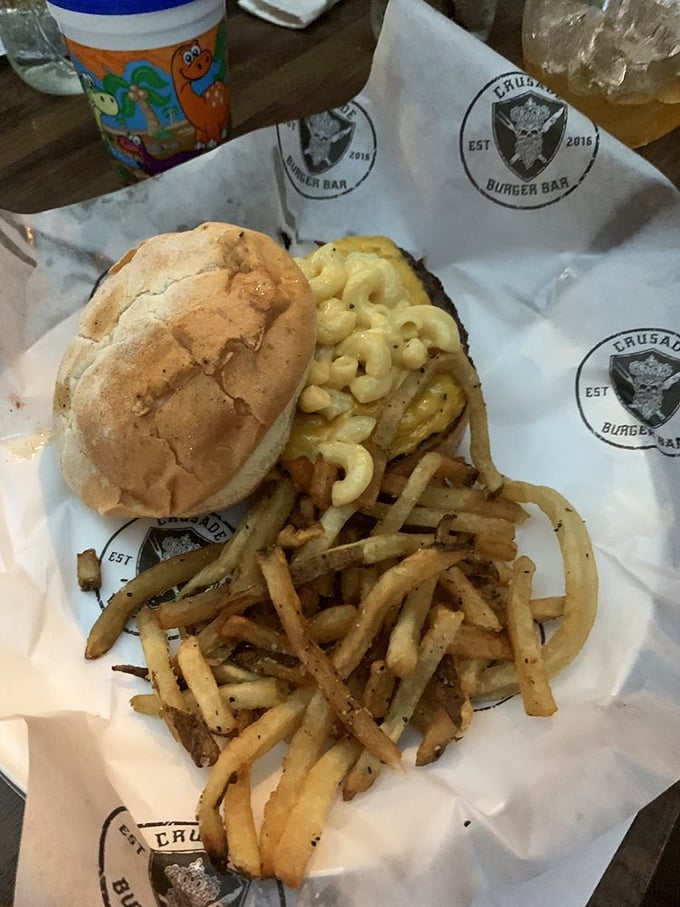 Mac attack! This burger's cheesy crown turns comfort food into a royal feast fit for a carb king.