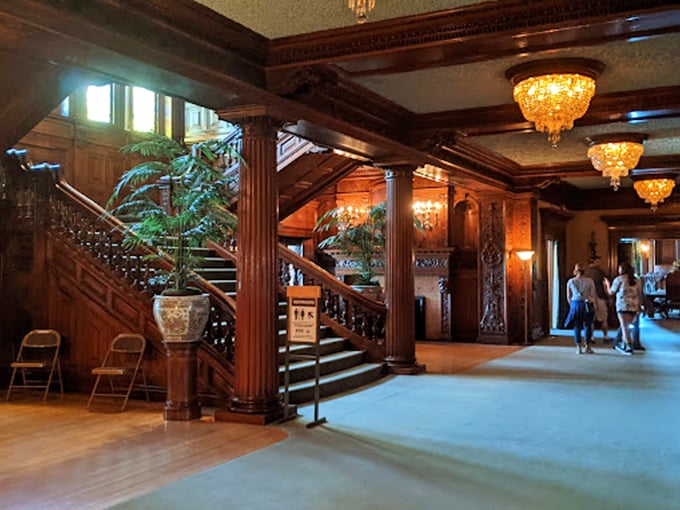 Stairway to heaven? More like stairway to "I need a breather." But with chandeliers like that, who needs cardio when you've got crystal-gazing?