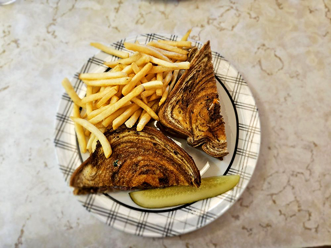 Holy crispy deliciousness, Batman! This Swiss patty melt and fries combo is the superhero duo your taste buds have been waiting for. Kryptonite for any diet, but who's counting?