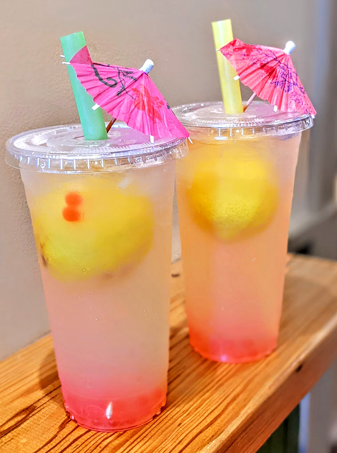 Tropical vibes meet tangy treats! These colorful lemonades look ready to transport you to a beachside pickle party.