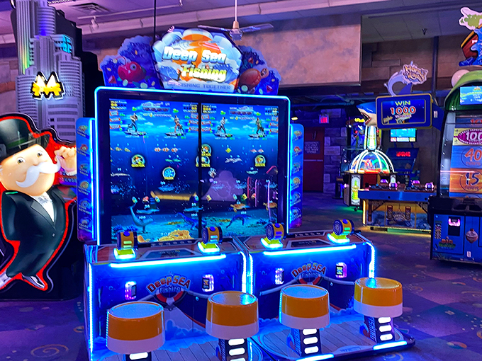 Dive into a sea of digital delights! This arcade is like Vegas for the juice box crowd, with games that'll make your quarters disappear faster than you can say "High Score."