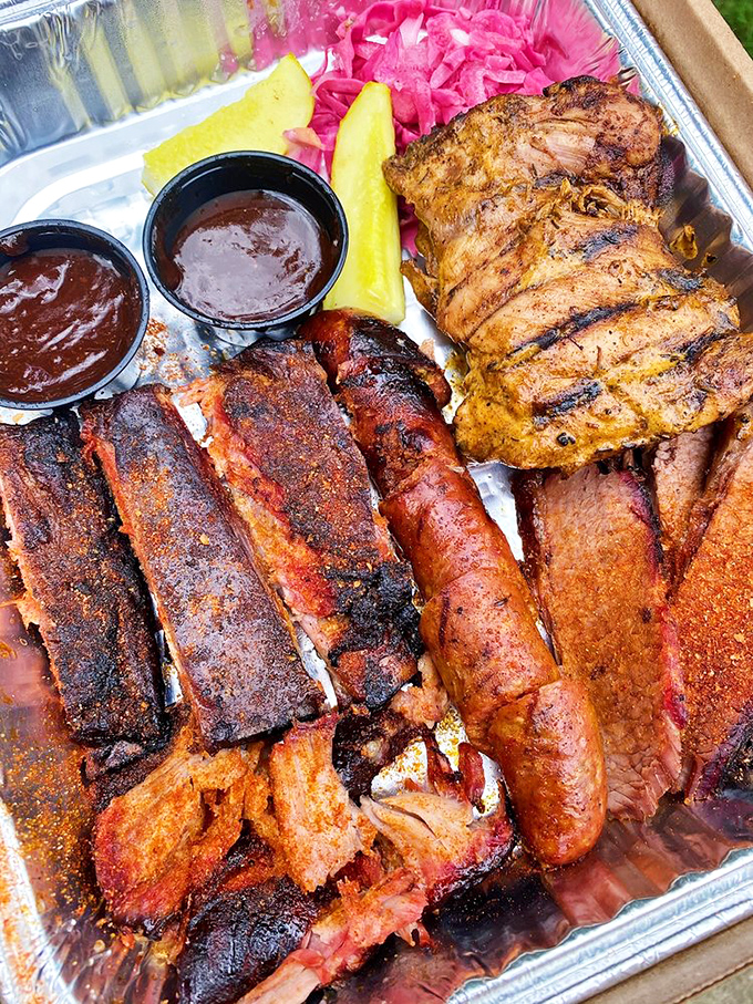Holy smokes! This tray is what barbecue fantasies are made of. It's not a meal; it's a meat lover's masterpiece.
