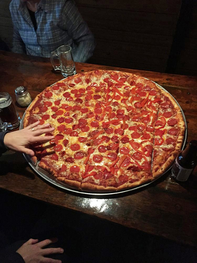 Holy pepperoni, Batman! This pizza's so loaded, it might need its own zip code. Grab a slice before it disappears!