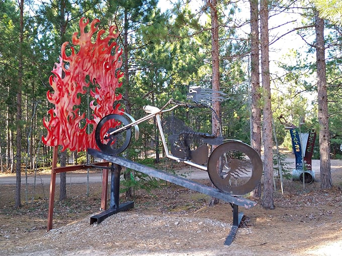 Talk about a hot ride! This metal cyclist is perpetually racing through flames, giving new meaning to the phrase "burning rubber."