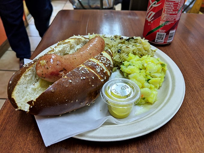 Holy wurst, Batman! This bratwurst plate is the superhero your hunger needs, complete with a sidekick of sauerkraut.