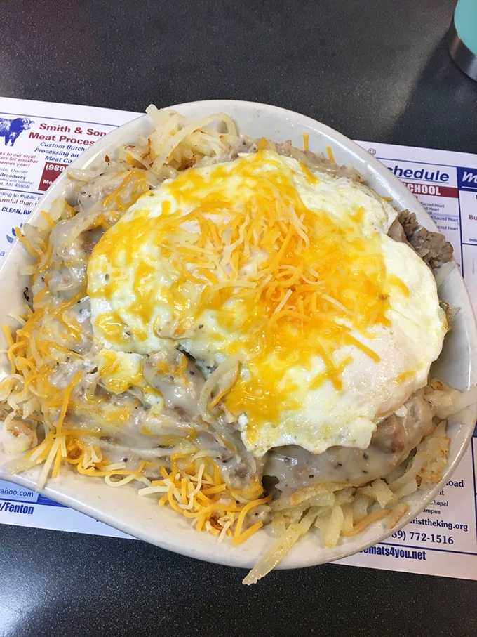 Behold, the Country Skillet! A mountain of morning goodness that'll fuel your adventures or, let's be honest, your nap.