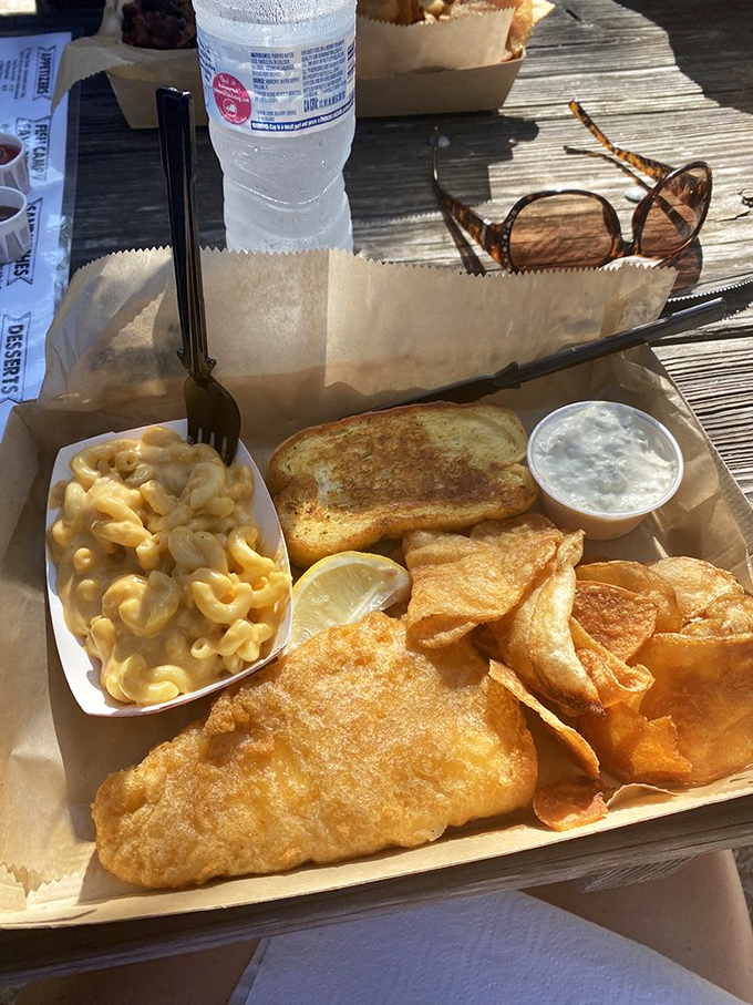 Golden-fried perfection meets creamy mac 'n' cheese &ndash; it's like a hug for your taste buds. Comfort food, Snook Haven style!