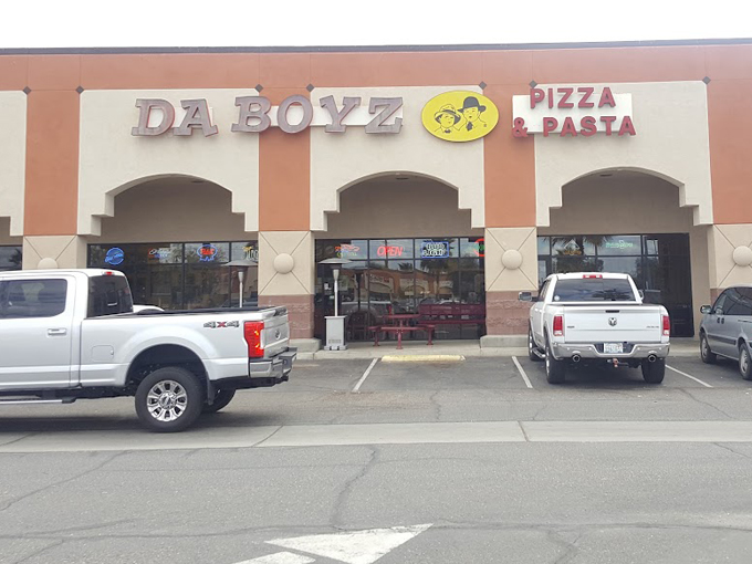 Trucks parked outside Da Boyz like teenagers at a drive-in. This place is more popular than a pool on a hot Arizona day!