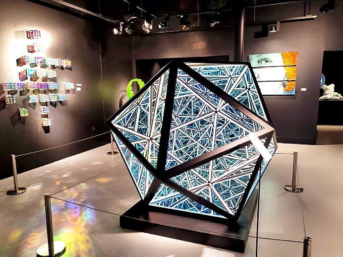 Geometry gone wild! This crystalline creation looks like what would happen if a disco ball and a Rubik's Cube had a glittery love child.