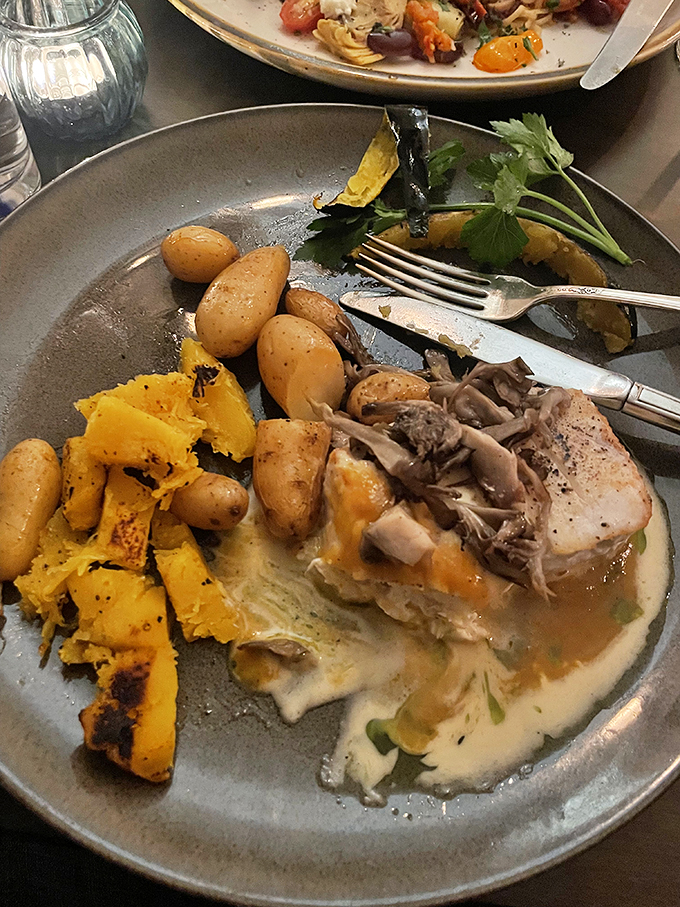 Holy halibut, Batman! This plate is a superhero team-up of flavors, with perfectly cooked fish playing the caped crusader.