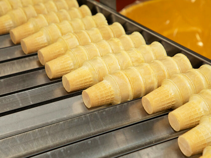 Fresh off the cone-veyor belt! These golden beauties are ready to cradle your favorite frozen treats in style.