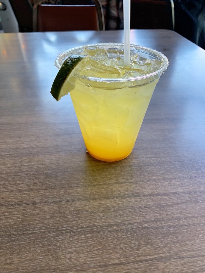 Liquid sunshine in a glass! This mango margarita is so bright, you might need shades just to look at it.