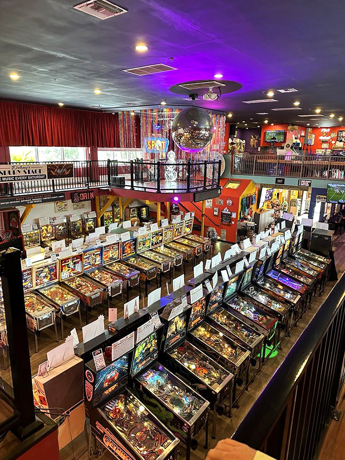 Pinball paradise awaits! Row upon row of flashing lights and silver balls beckon, each machine a portal to arcade nirvana.