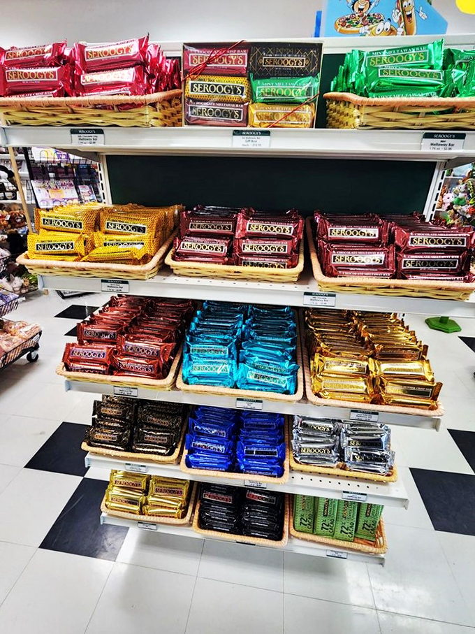 A rainbow of chocolate bars! From classic milk to exotic dark, these colorful wrappers hide treasures that would make Willy Wonka jealous.