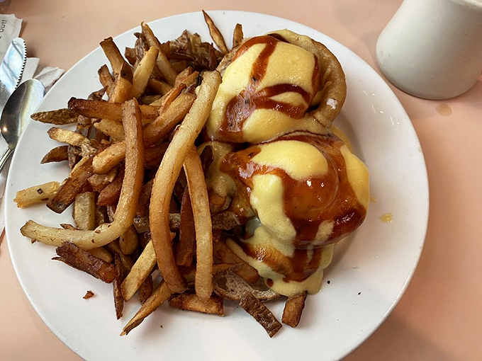Eggs Benedict's wild cousin! This plate is where breakfast meets BBQ, topped with a golden hollandaise crown fit for a hungry king.