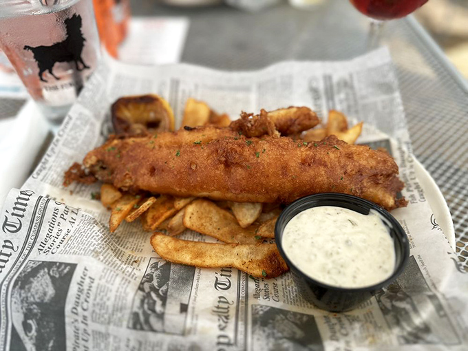 Golden, crispy, and served with a side of nostalgia &ndash; this fish and chips platter is like a warm hug for your stomach.