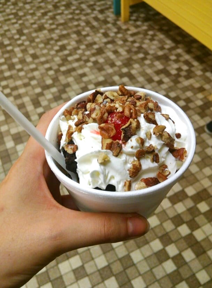 Fudge brownie perfection! It's like someone took all your chocolate dreams and piled them high in a cup of pure bliss.