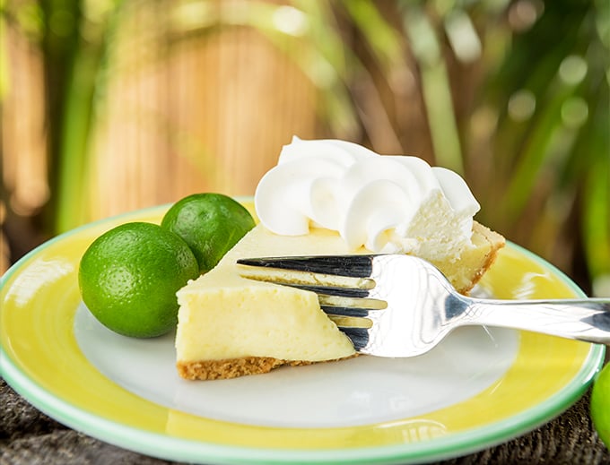 Fork-tender perfection! This slice of key lime pie is so photogenic, it could be the next Instagram influencer in the dessert world.