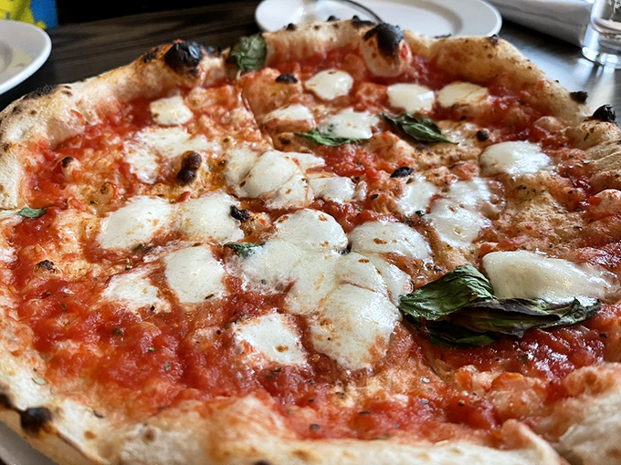 Behold, the Margherita in all its glory! This pizza is so authentically Italian, it practically comes with its own passport. Mamma mia, indeed!
