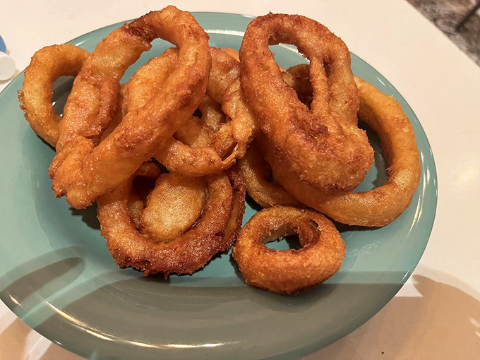 These aren't your average onion rings &ndash; they're golden halos of crispy perfection. One bite and you'll be singing "Ring of Fire" with joy!