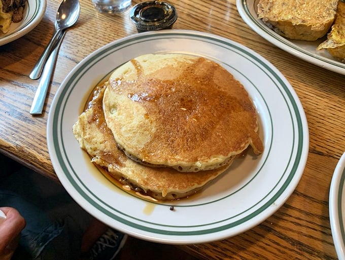 Pancake perfection achieved! These golden discs of joy are so fluffy, they might float right off your plate if not anchored by syrup.
