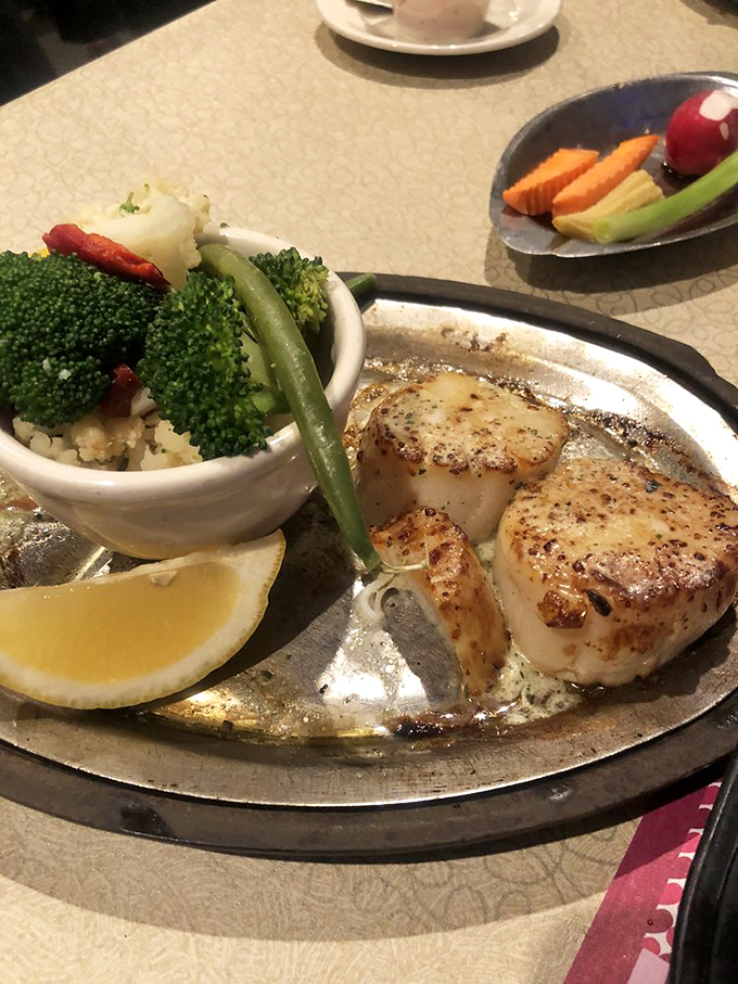 Ocean's finest, landlocked! These golden-seared scallops are so fresh, you'll swear you can hear seagulls in the cornfields.