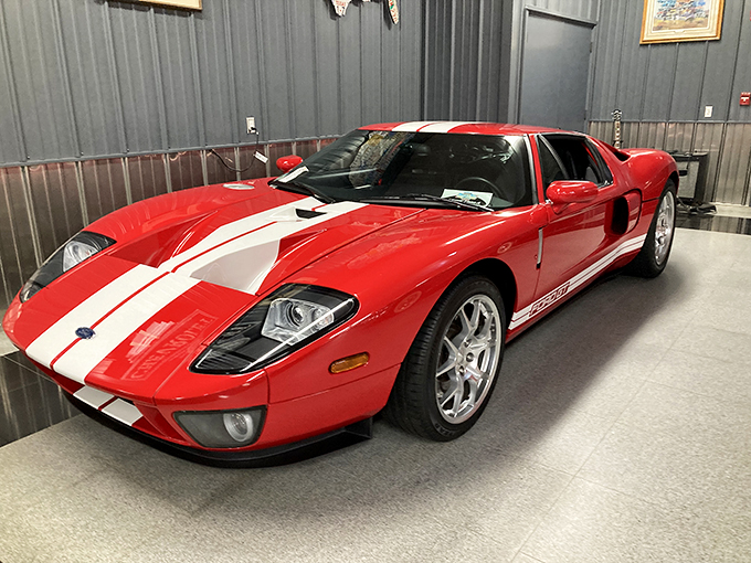 Red alert! This Ford GT is hotter than a Minnesota summer. It's the kind of car that makes speed limits seem like gentle suggestions.