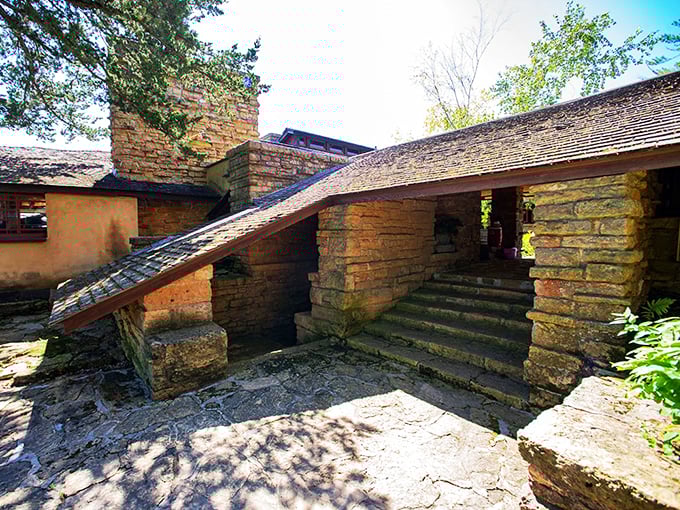 Stairway to heaven? Nah, just Frank's fancy foyer. These steps are like a geological layer cake of architectural brilliance.