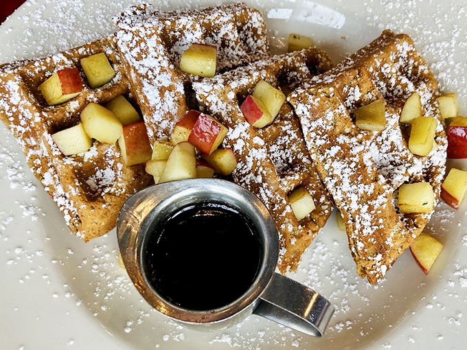 Waffle wonderland! These golden beauties are like edible sunshine, topped with fruit jewels and a syrup moat fit for breakfast royalty.
