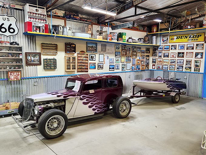Route 66 meets Lilliput in this corner of car heaven. The walls are a roadmap of nostalgia, peppered with automotive history.