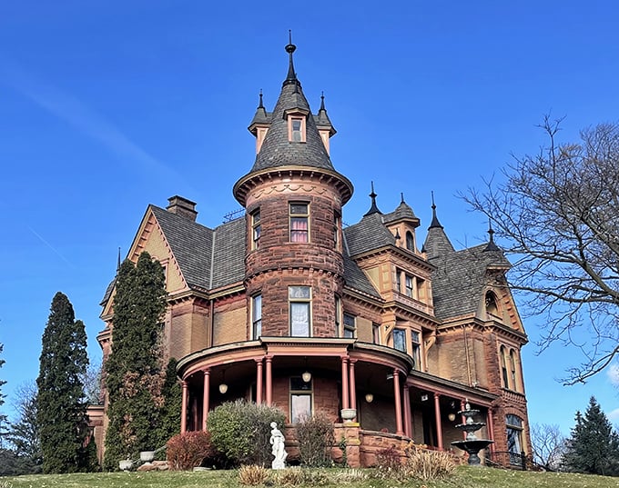 Henderson Castle: Victorian grandeur meets haunted chic. This red sandstone beauty has more towers than your average ghost story.