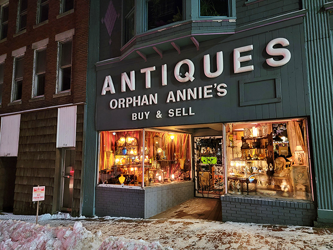 Night owls, rejoice! This after-hours antique haven glows like a beacon of vintage goodness in the dark.