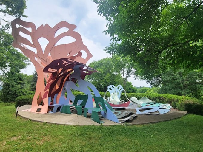 "Where art breaks free from gallery walls and plays hide-and-seek with nature. No touching, please!"